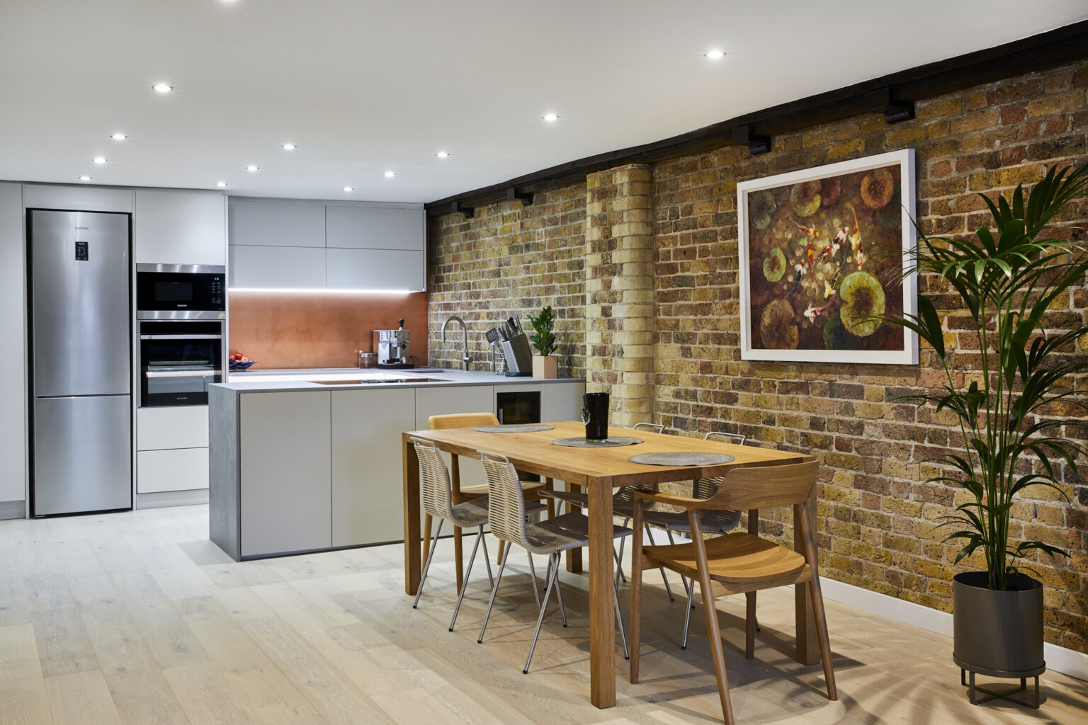 Opening up the kitchen space in an industrial warehouse setting by The ...