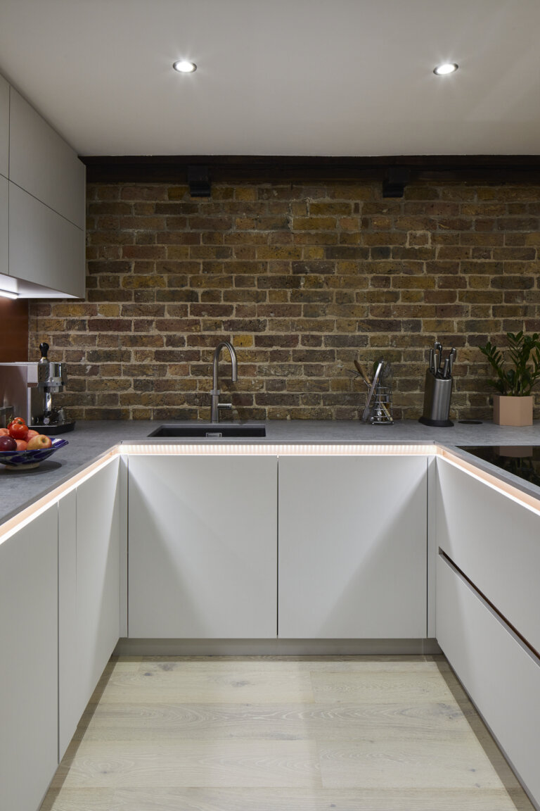 Opening up the kitchen space in an industrial warehouse setting by The ...