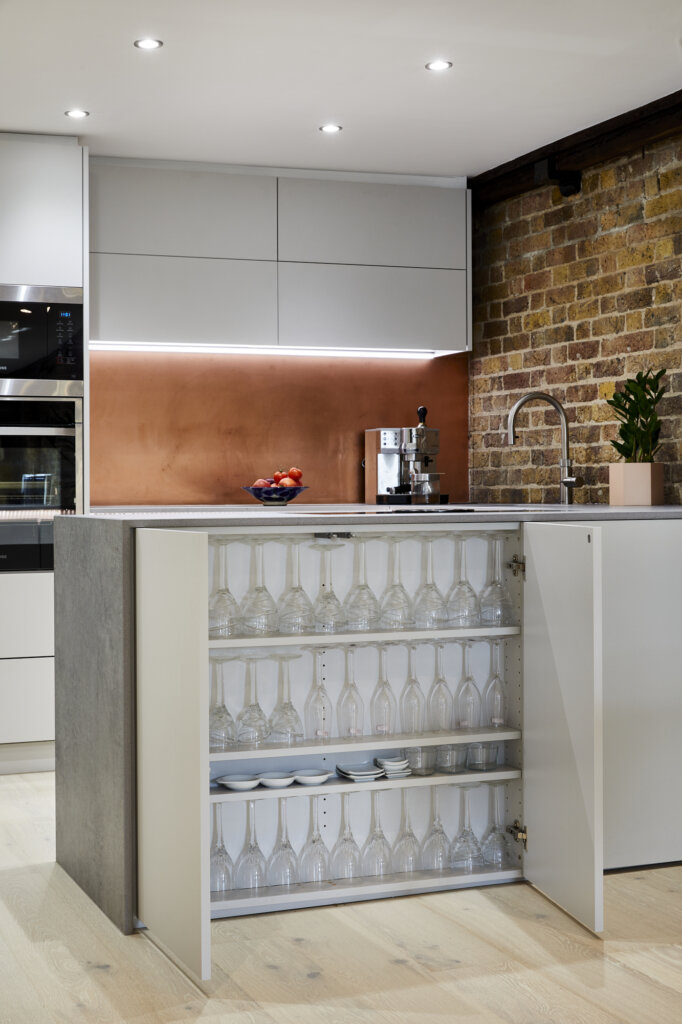 Opening up the kitchen space in an industrial warehouse setting by The ...