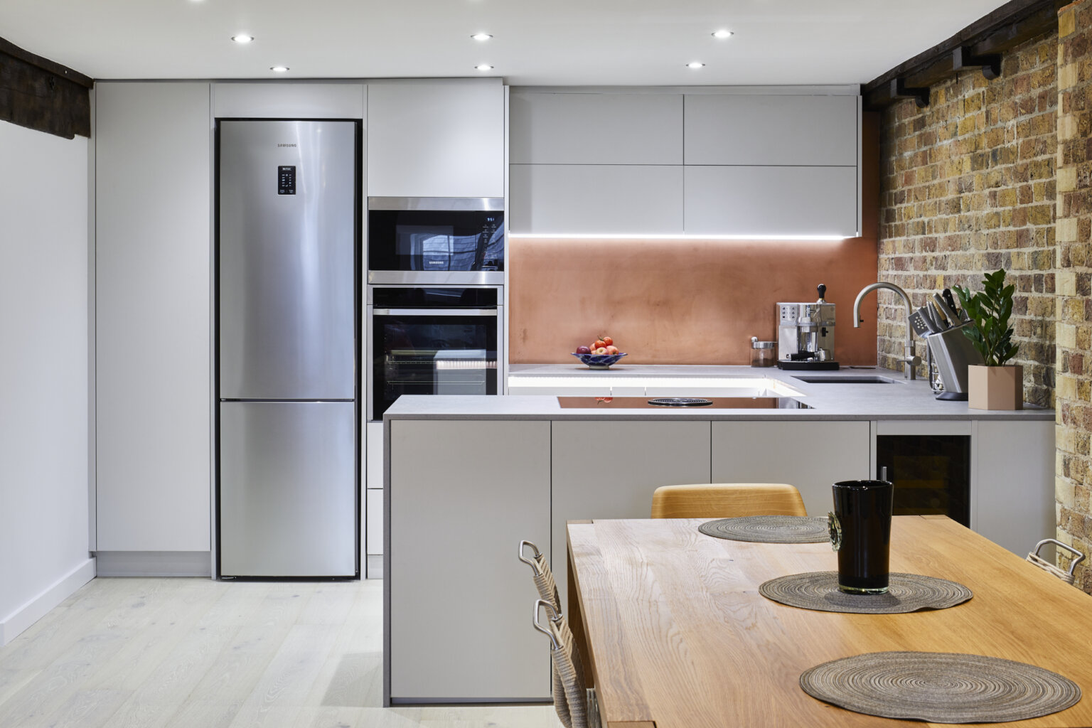 Opening up the kitchen space in an industrial warehouse setting by The ...